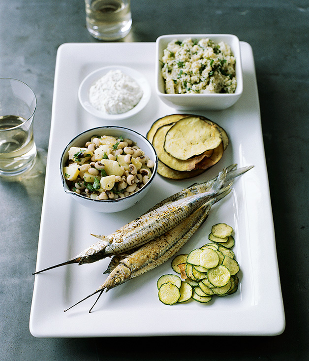 Garfish with fried vegetables, tzatziki, and burghul and black-eyed ...